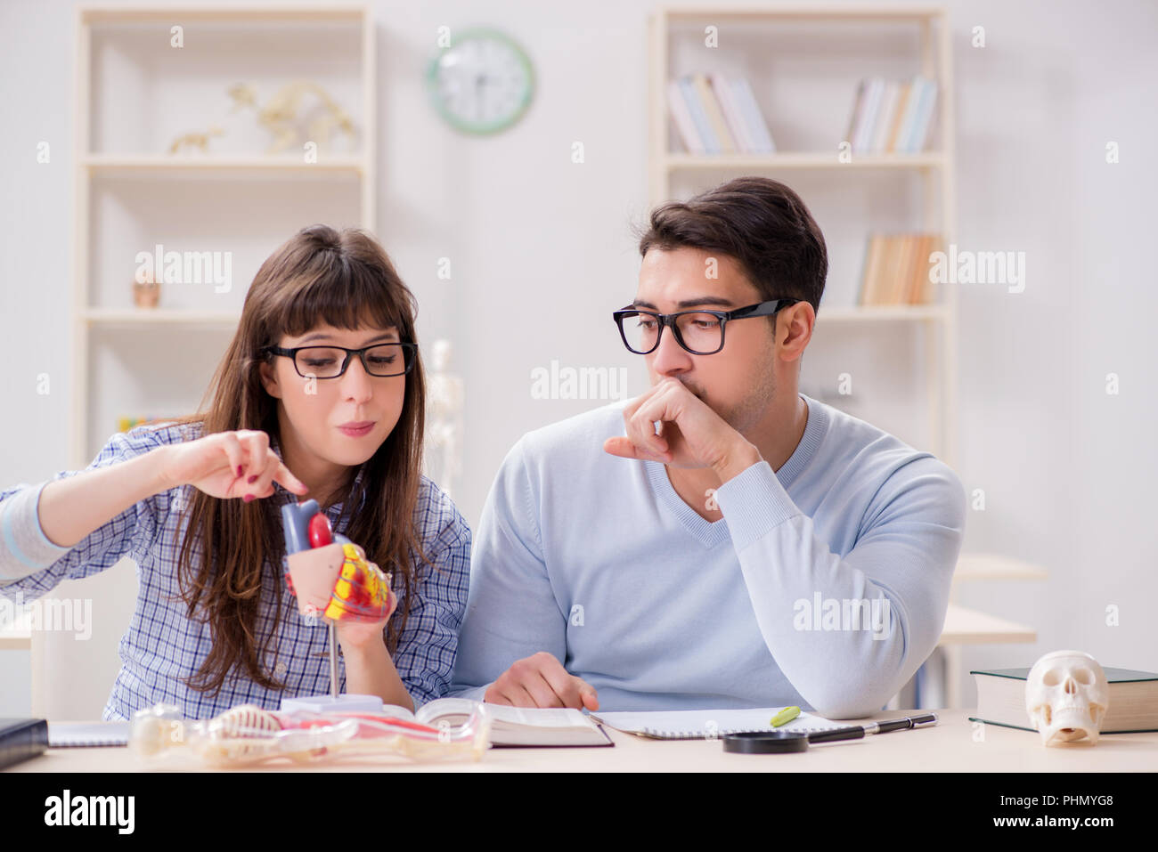 Two medical students studying in classroom Stock Photo - Alamy