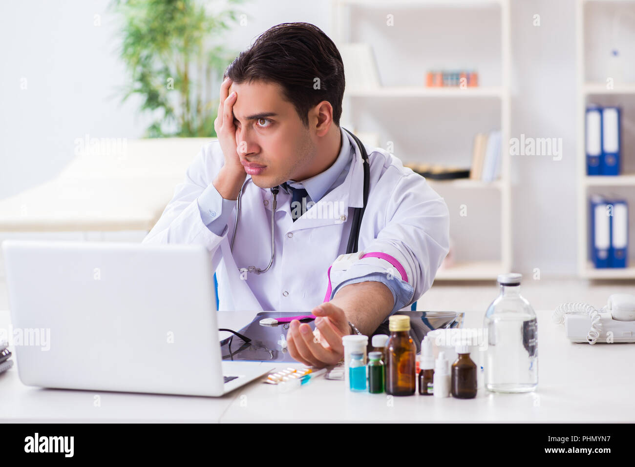 Doctor drug addict in hi-res stock photography and images - Alamy