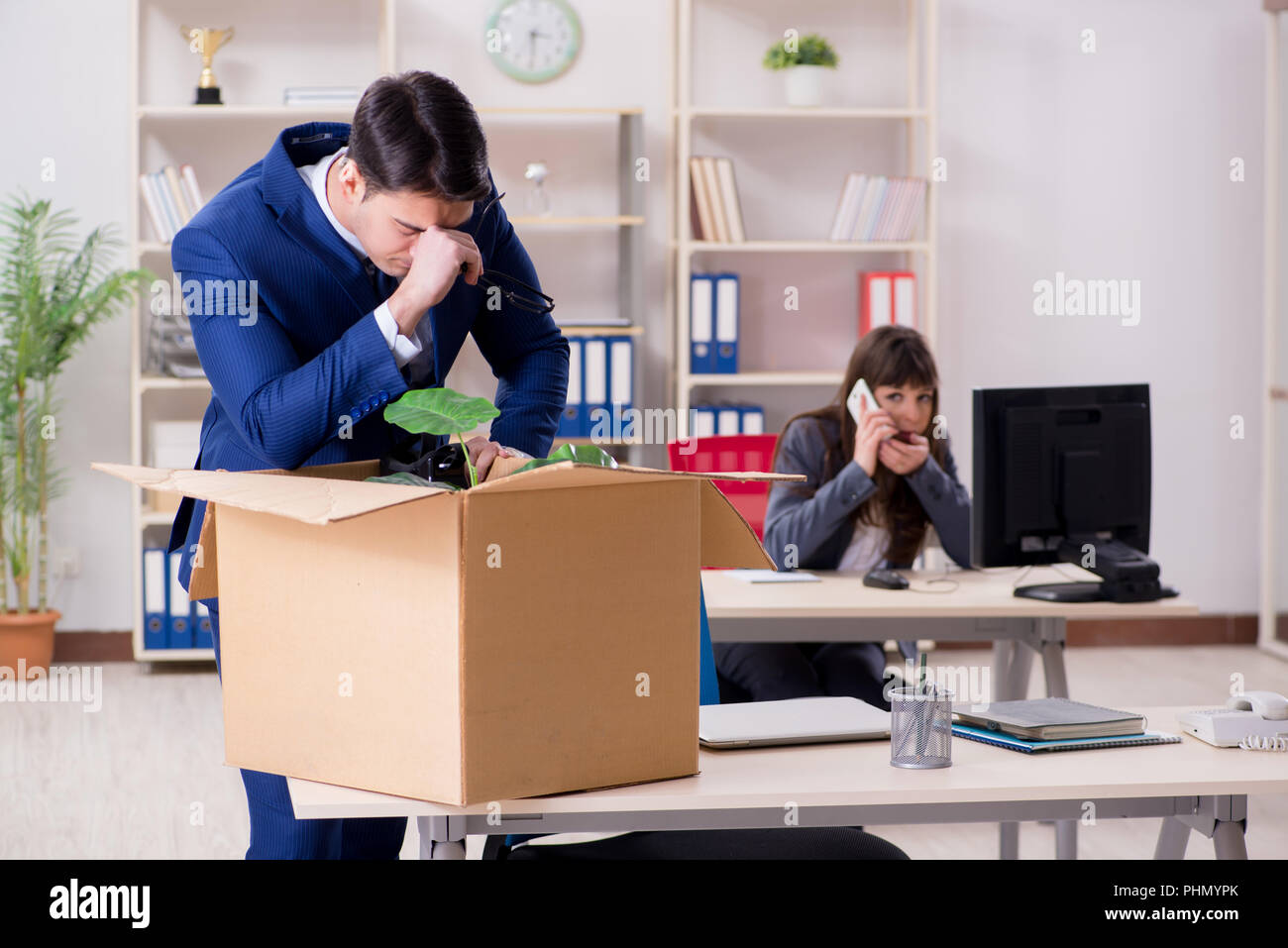 Person being fired from his work Stock Photo - Alamy
