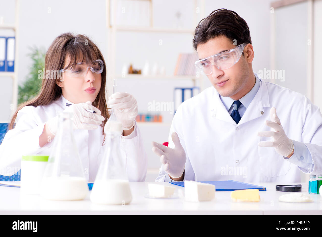 Two lab doctor testing food products Stock Photo - Alamy