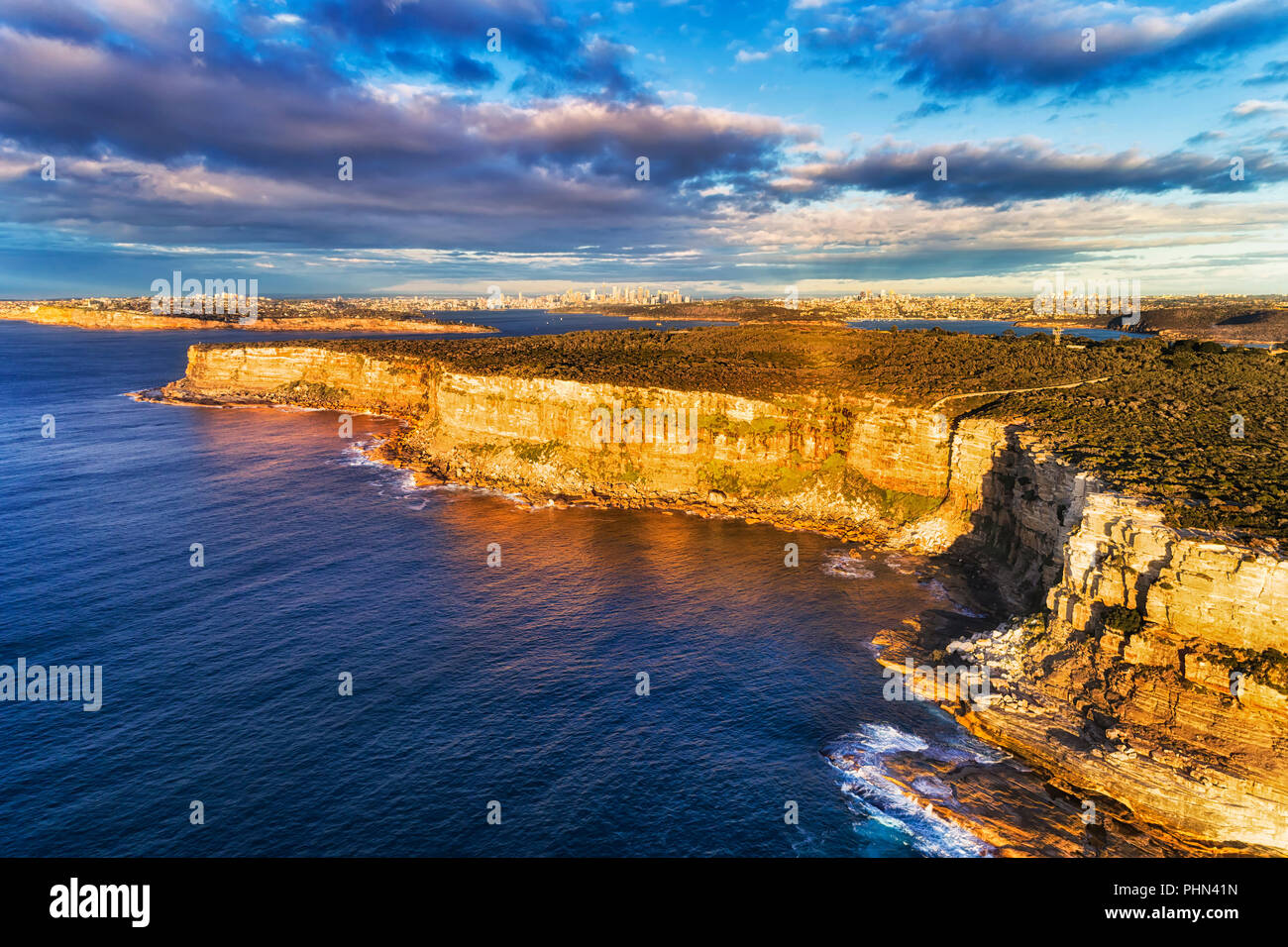 Steep sandstone cliffs of North Head plateau at the entrance to Sydney ...