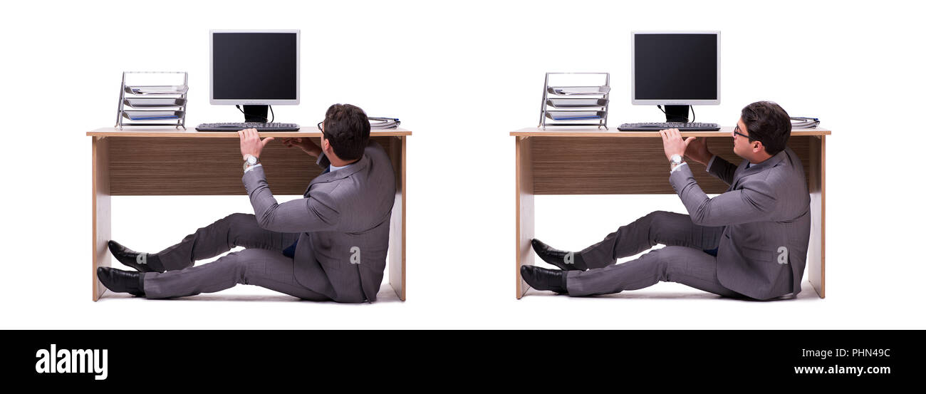 Hiding under desk Cut Out Stock Images & Pictures - Alamy
