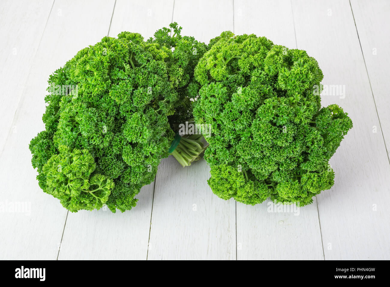 Raw green organic curly hi-res stock photography and images - Alamy