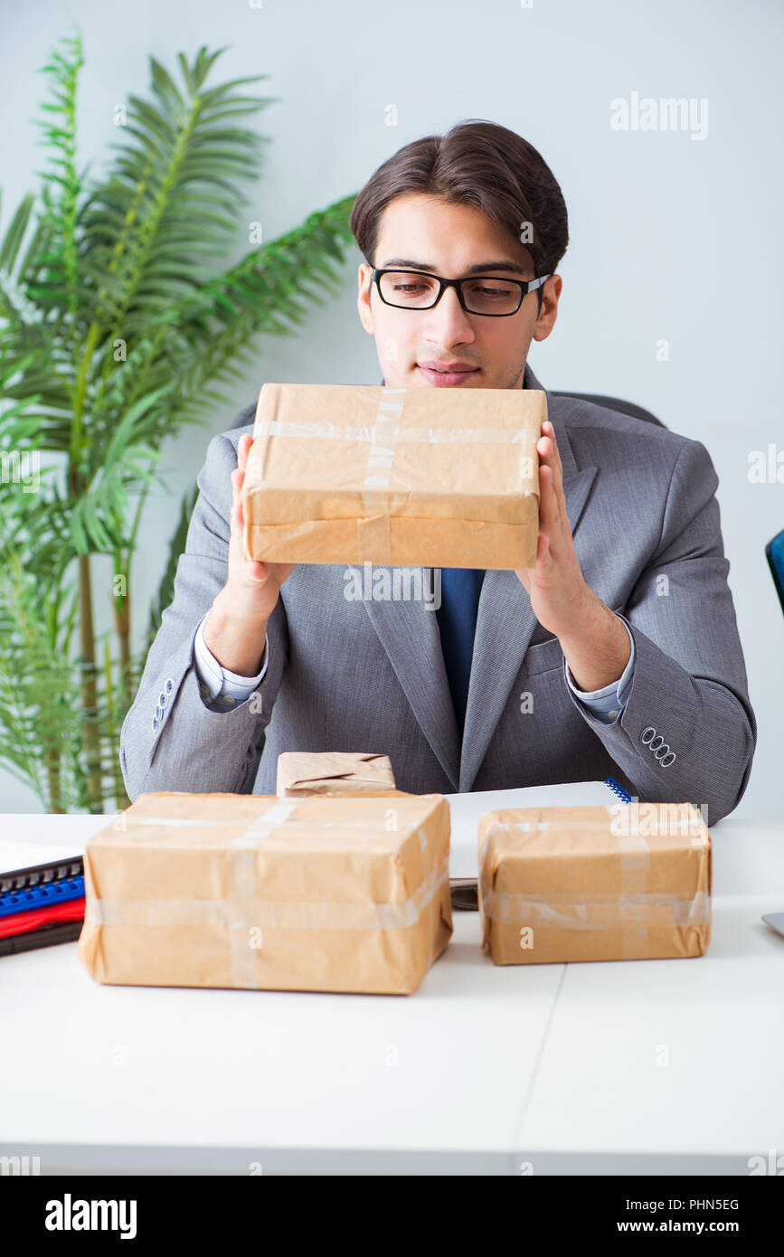 Business people receiving new mail and parcels Stock Photo - Alamy