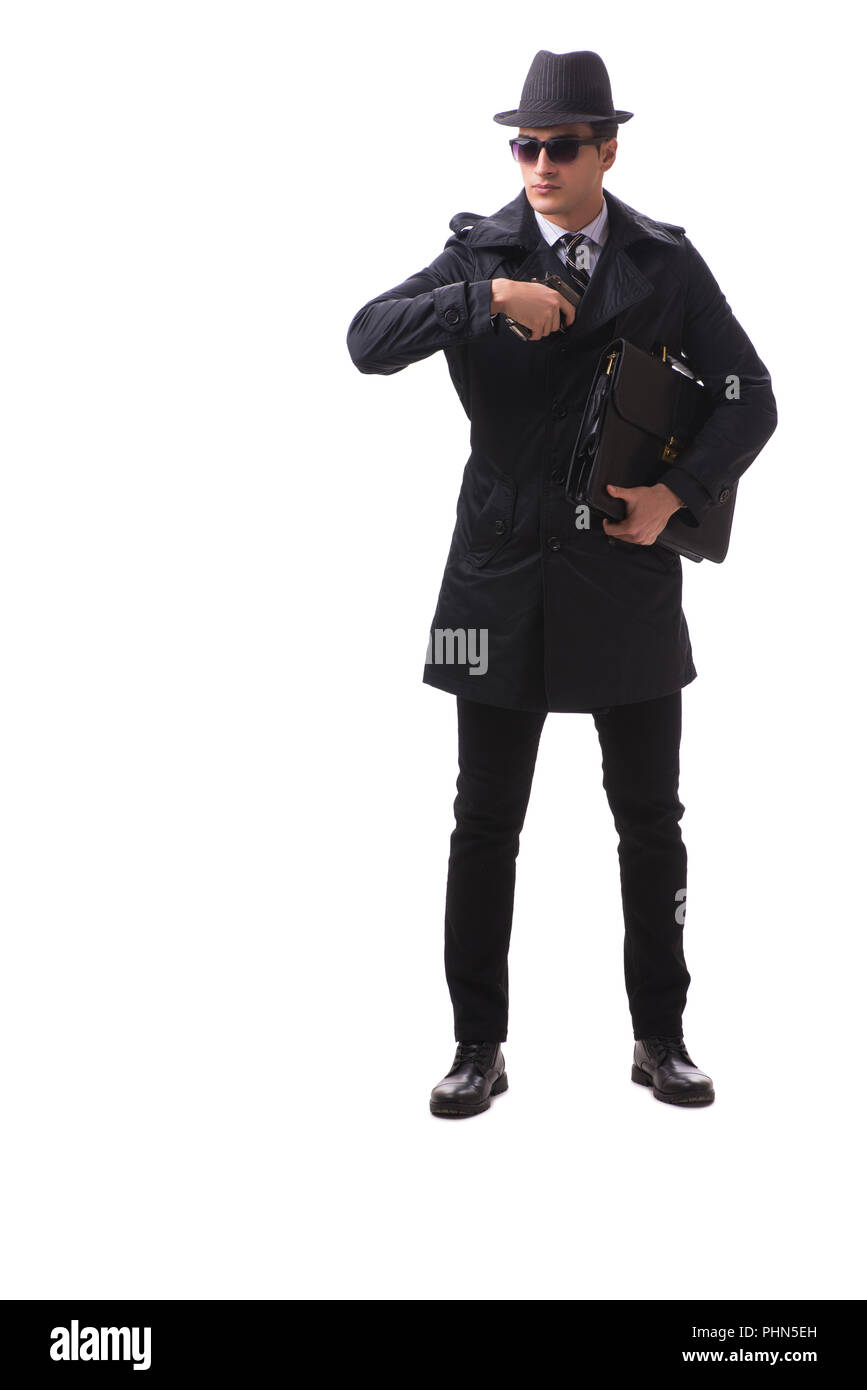 Man spy with handgun isolated on white background Stock Photo - Alamy