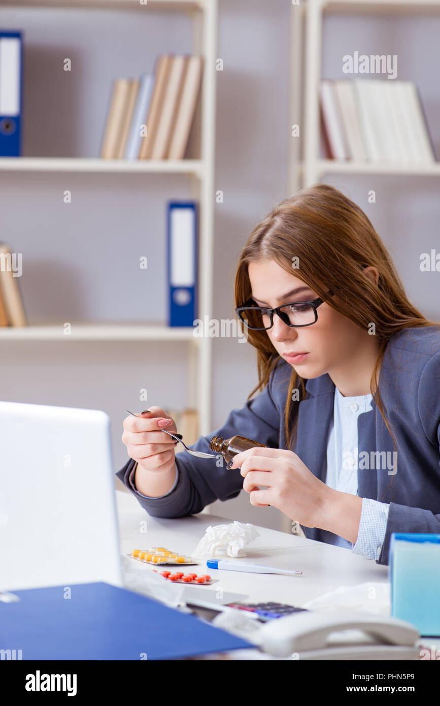 Businesswoman employee sick in the office Stock Photo - Alamy