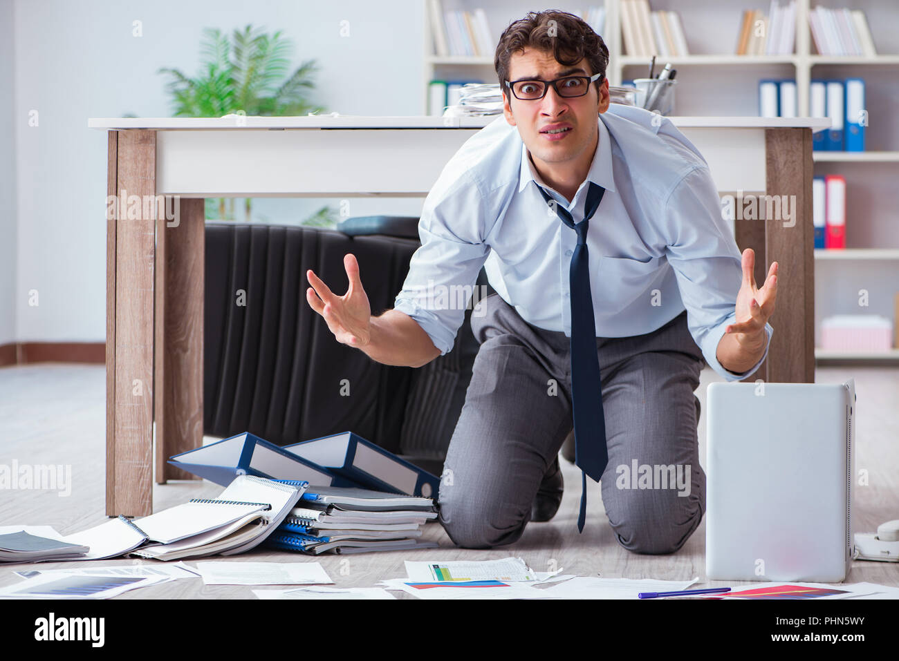 Bankrupt businessman angry in the office floor Stock Photo - Alamy
