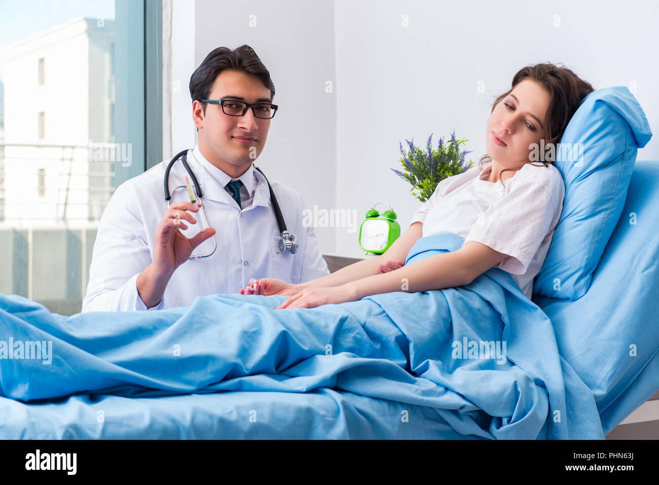 Doctor doing medical injection in hospital room Stock Photo - Alamy