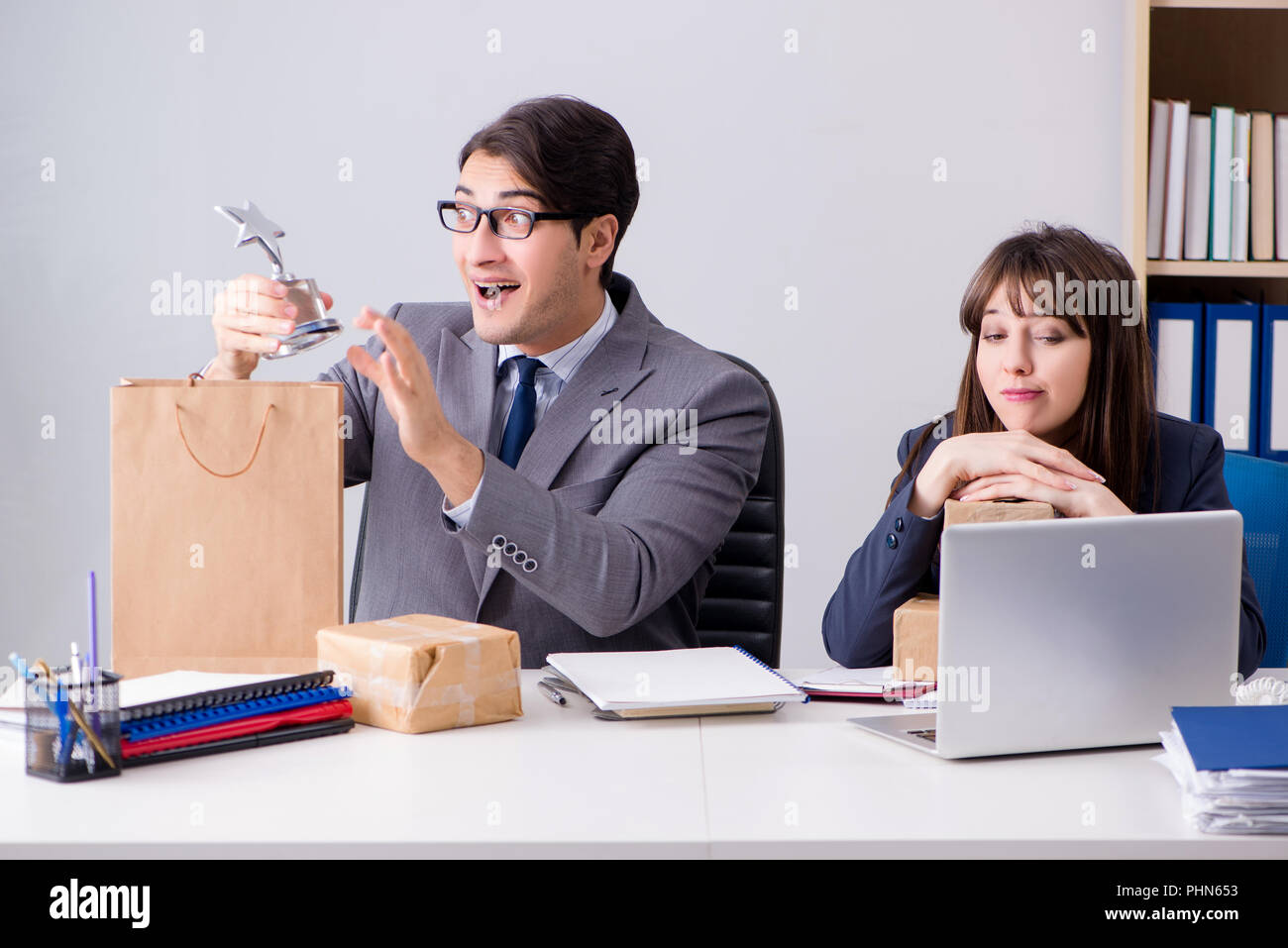Business people receiving new mail and parcels Stock Photo - Alamy