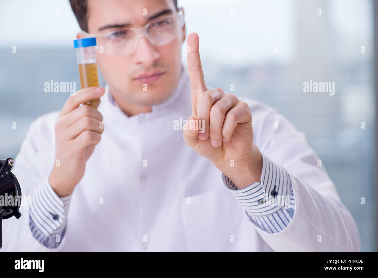 Medical concept with doctor and test tube Stock Photo - Alamy