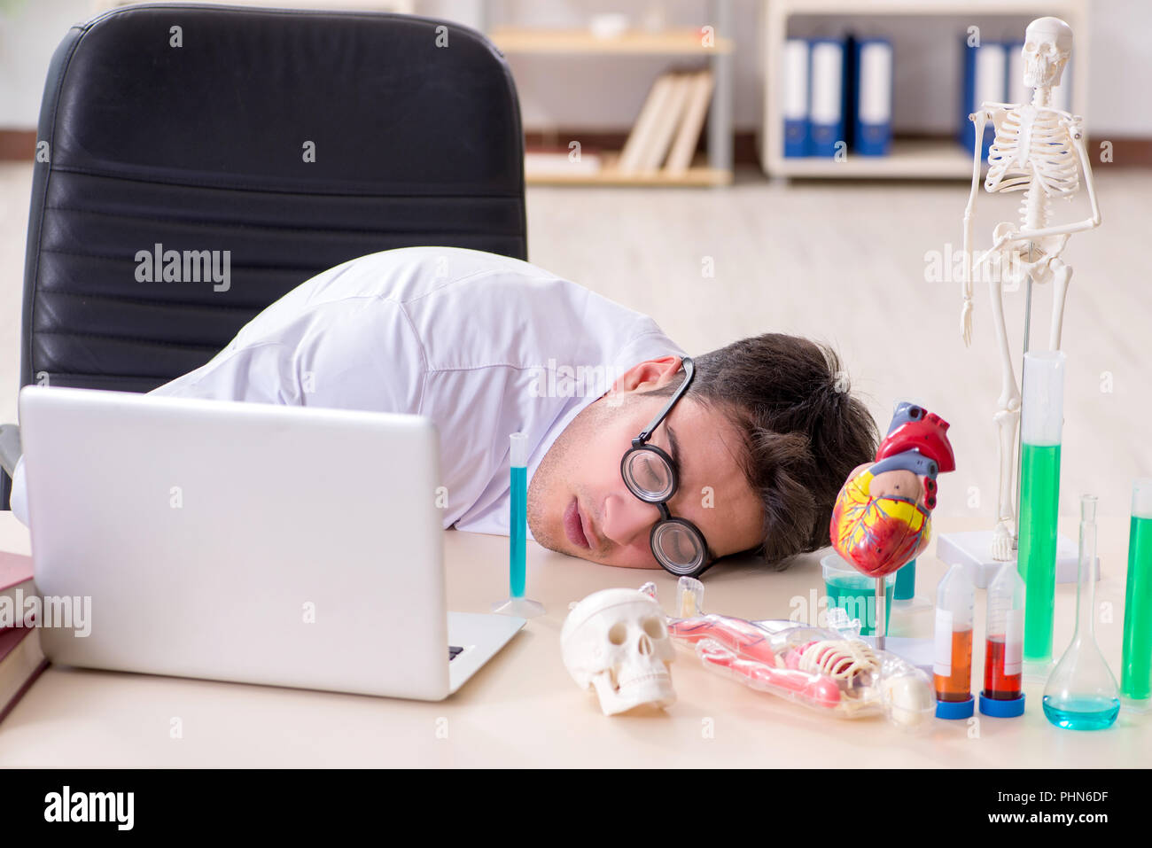 Funny doctor having fun in hospital lab Stock Photo - Alamy