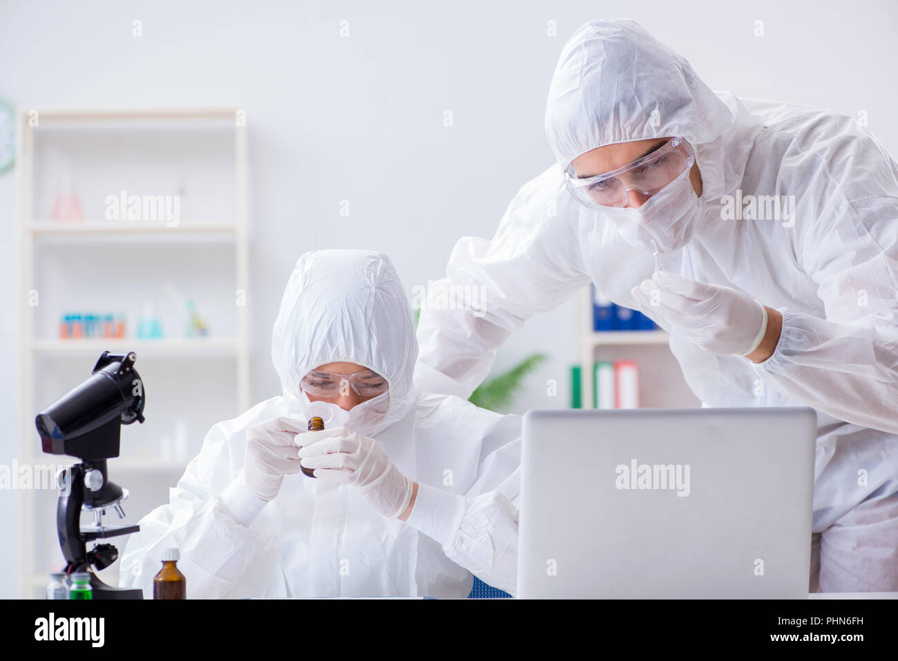 Two scientists working in the chemical lab Stock Photo - Alamy