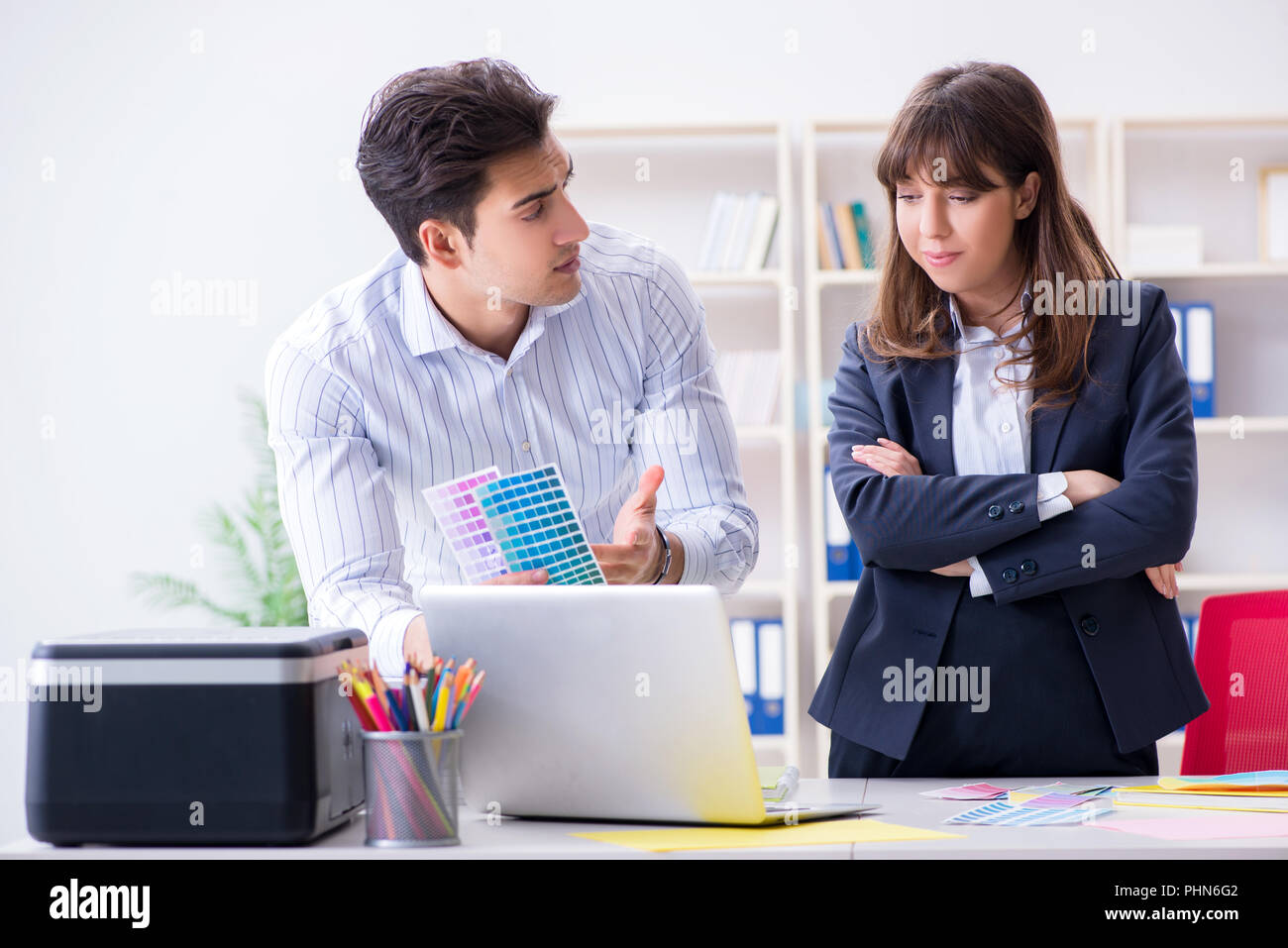 People discussing new design of project Stock Photo - Alamy