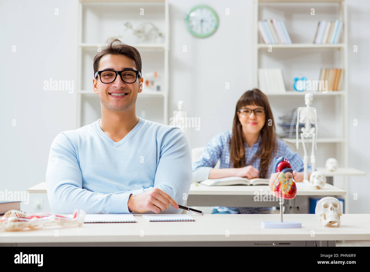 Two medical students studying in classroom Stock Photo - Alamy