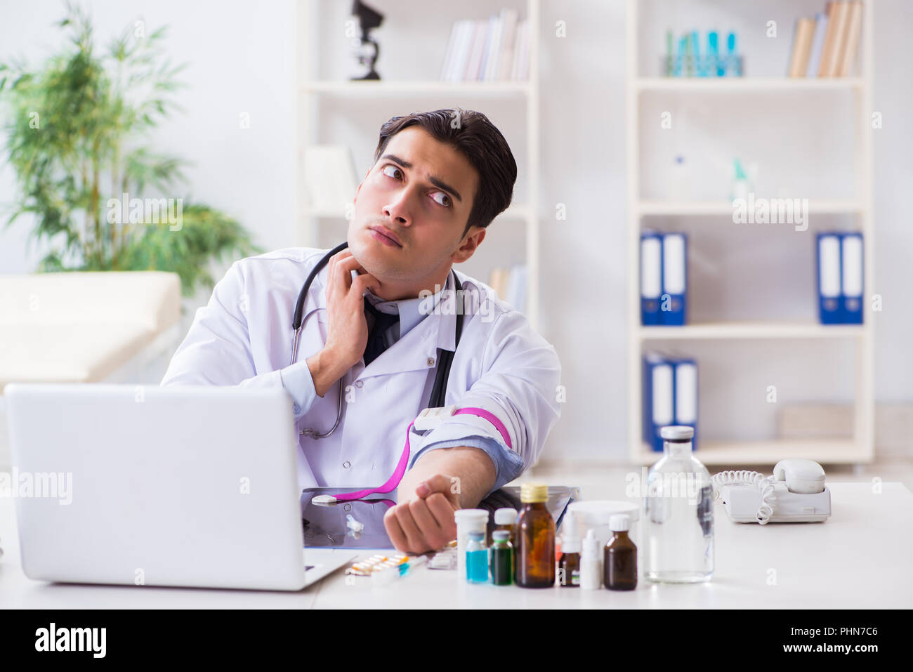 Doctor drug addict in the hospital Stock Photo - Alamy