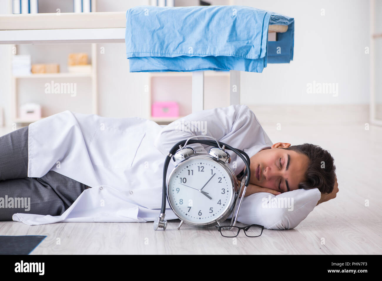 Sleepy doctor tired after long night shift Stock Photo - Alamy