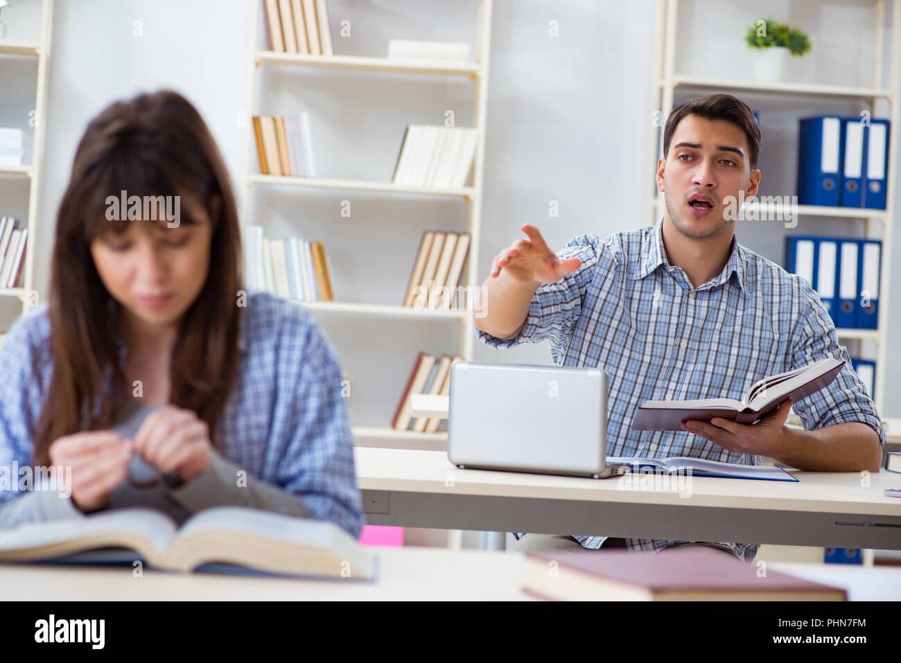 Students sitting and studying in classroom college Stock Photo - Alamy