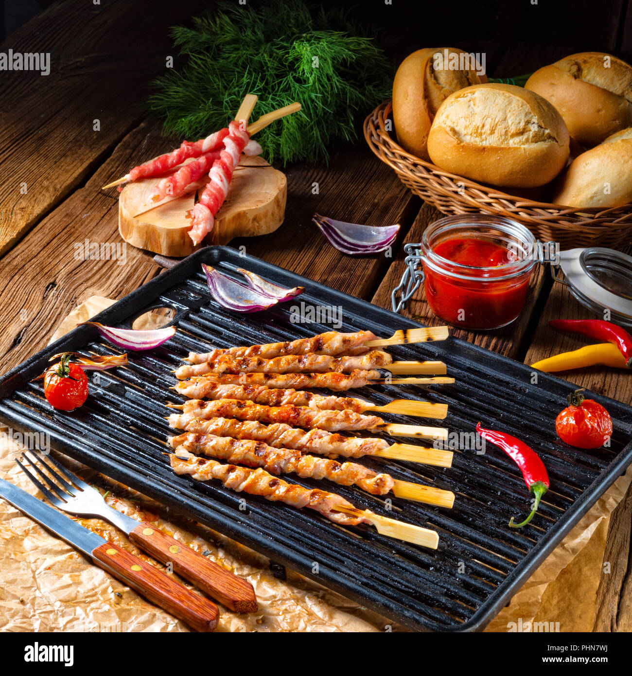 Fresh and crispy rustic pork belly grill sticks Stock Photo - Alamy