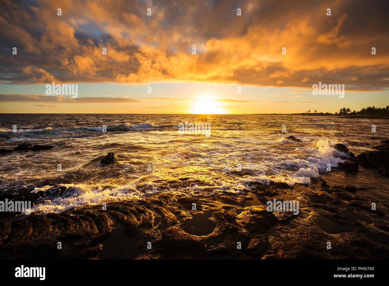 Hawaiian beach at sunrise Stock Photo - Alamy