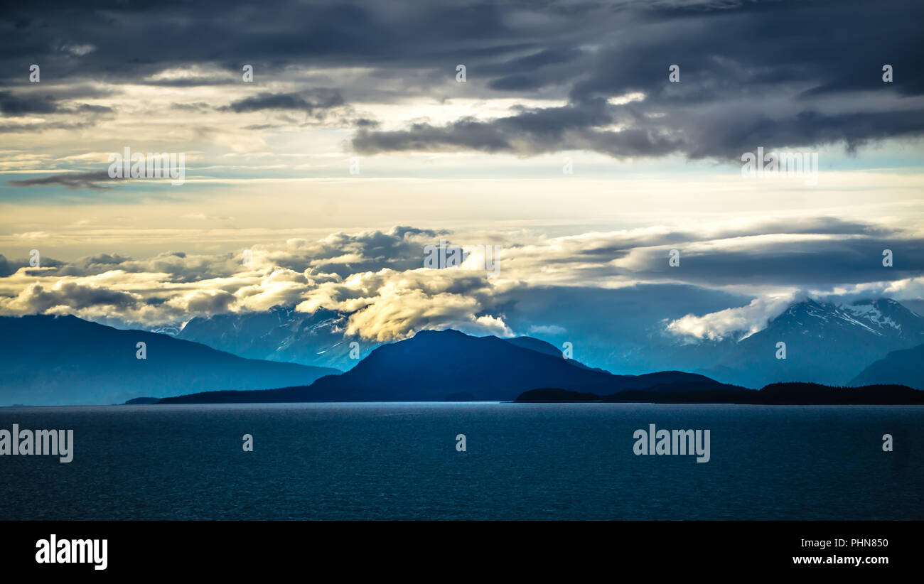 mud bay alaska mountain range at sunset Stock Photo - Alamy