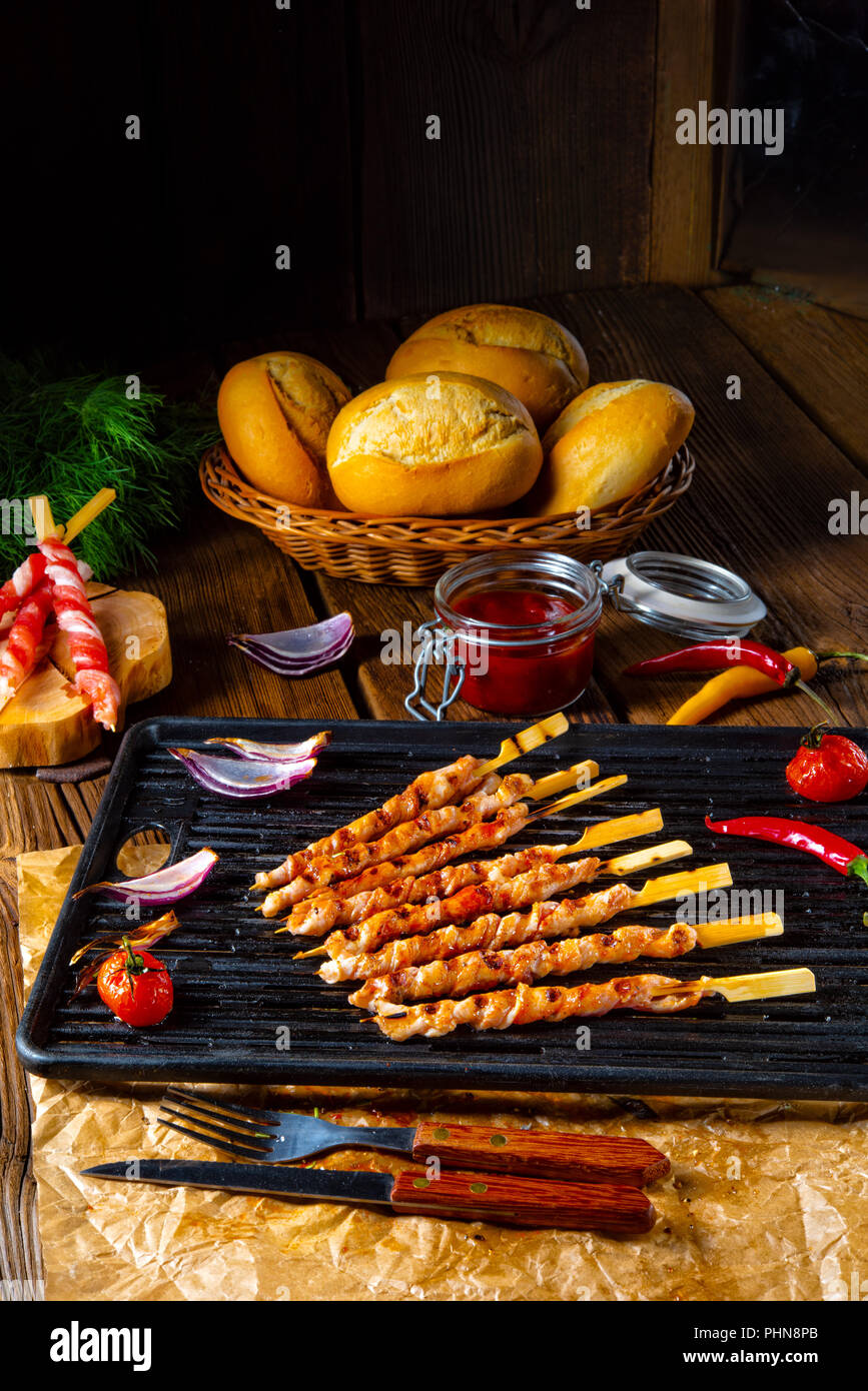 Fresh and crispy rustic pork belly grill sticks Stock Photo - Alamy