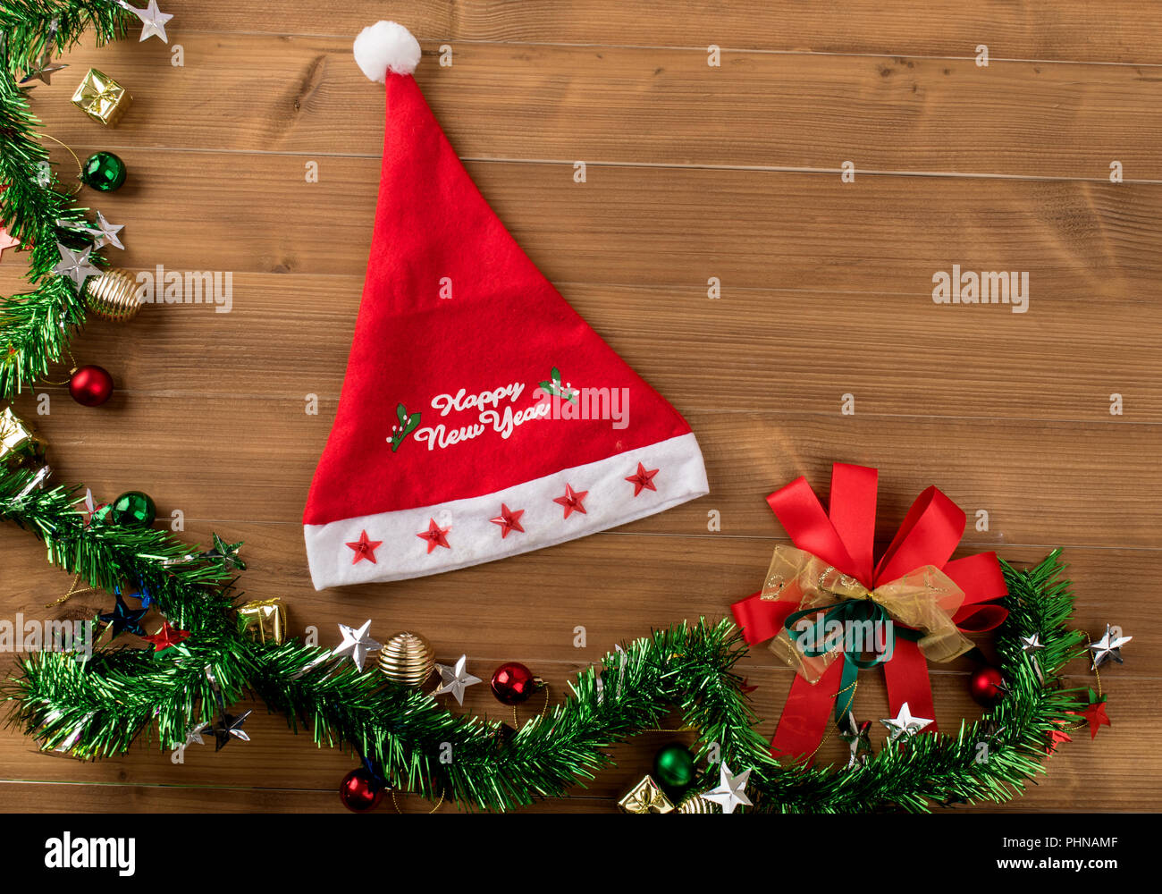 Christmas border design on the wooden background Stock Photo - Alamy