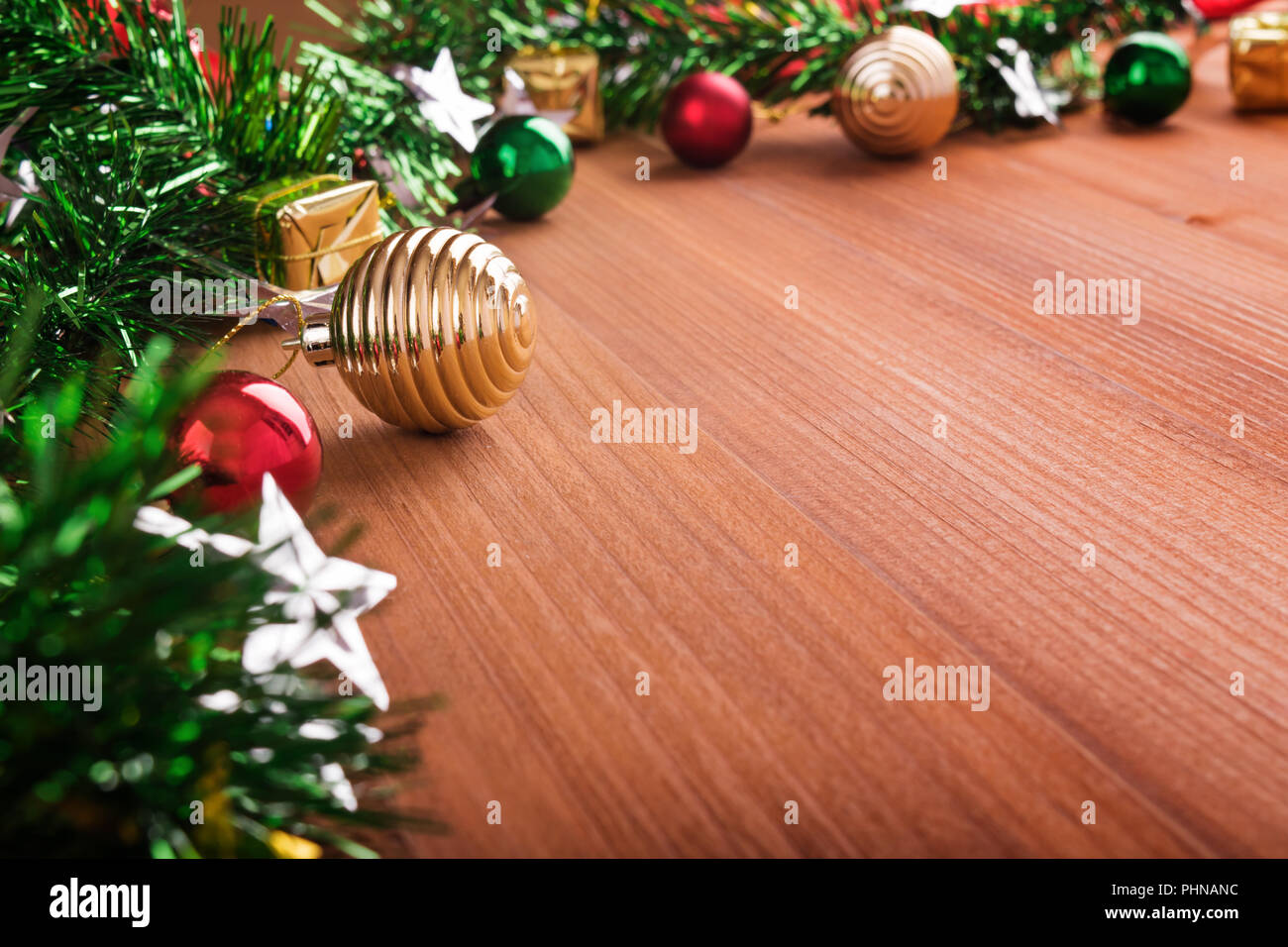 Christmas border design on the wooden background Stock Photo - Alamy