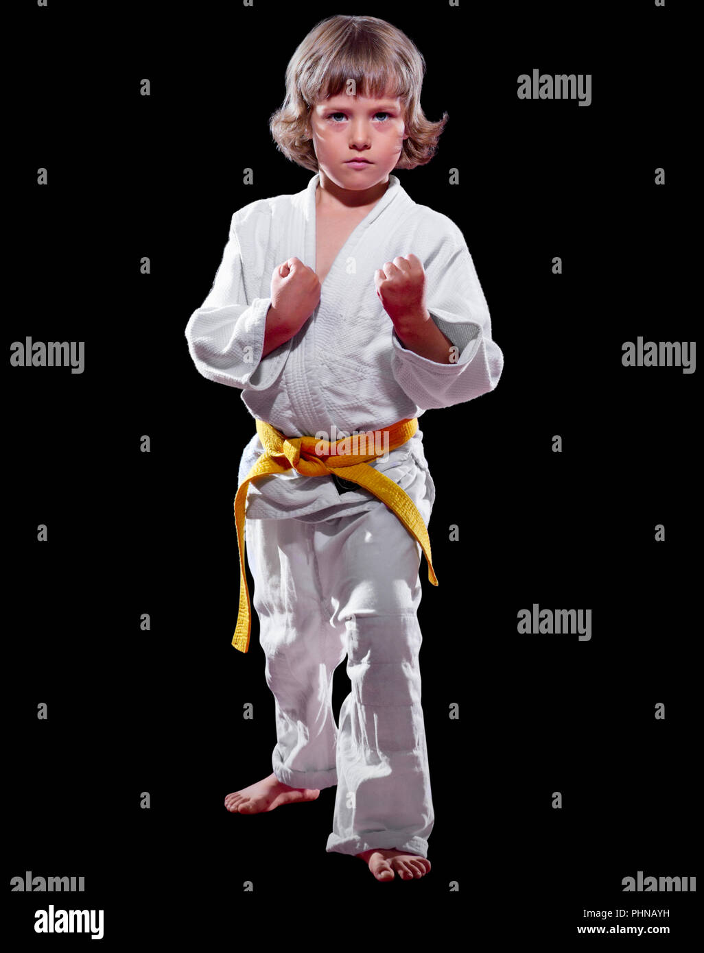 Little boy martial arts fighter isolated Stock Photo - Alamy