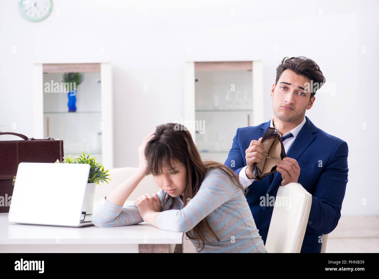 Bankrupt family with no cash at home Stock Photo - Alamy