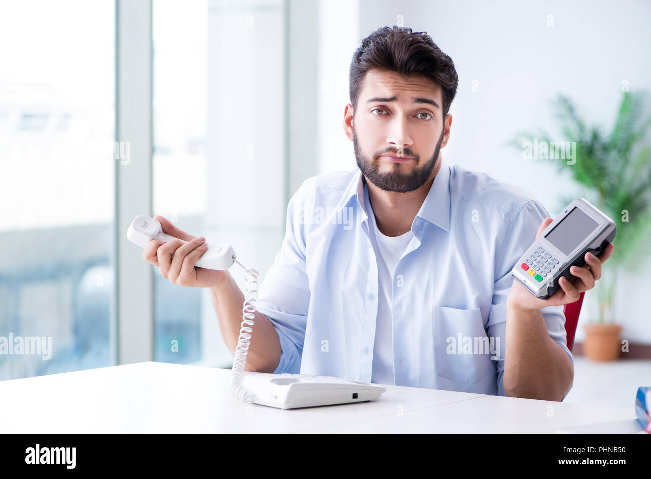 Man processing credit card transaction with POS terminal Stock Photo ...