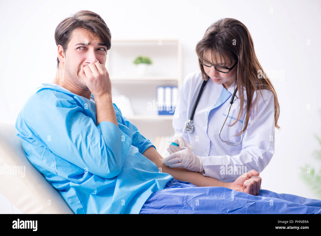 Scared patient hi-res stock photography and images - Alamy
