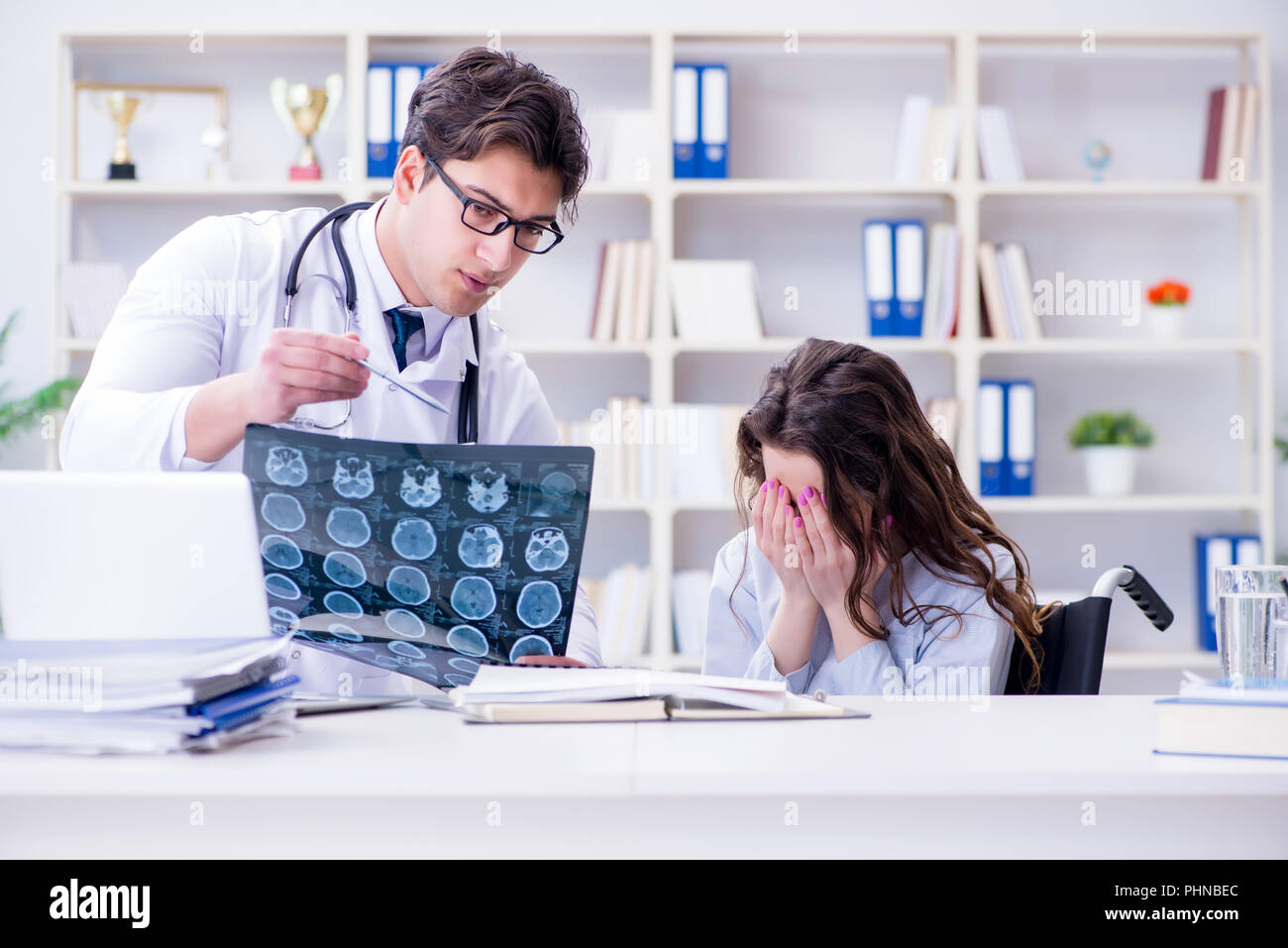 Doctor feeling pessimistic about x-ray image of patient Stock Photo - Alamy