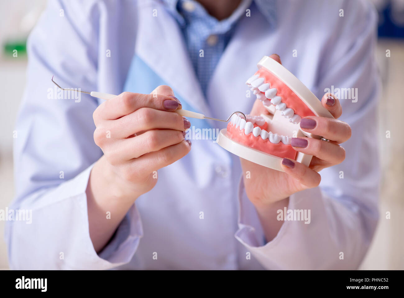 Dentist practicing work on tooth model Stock Photo - Alamy