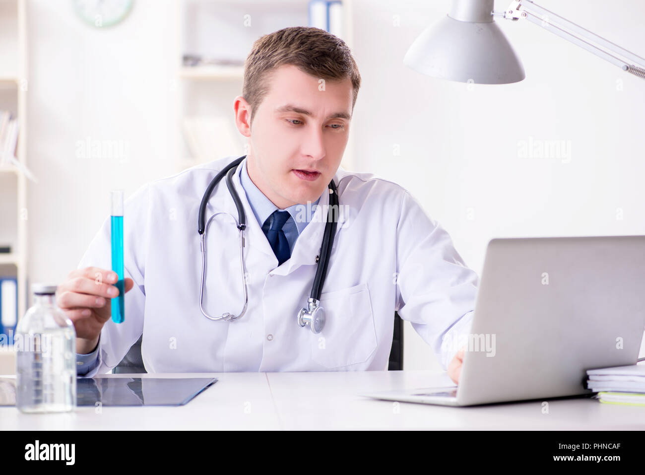 Scientist looking dna test results hi-res stock photography and images ...