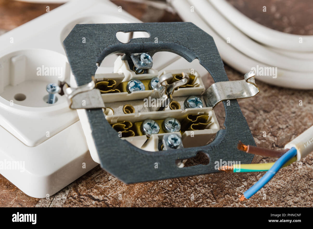 Electric socket and cable, close-up Stock Photo - Alamy