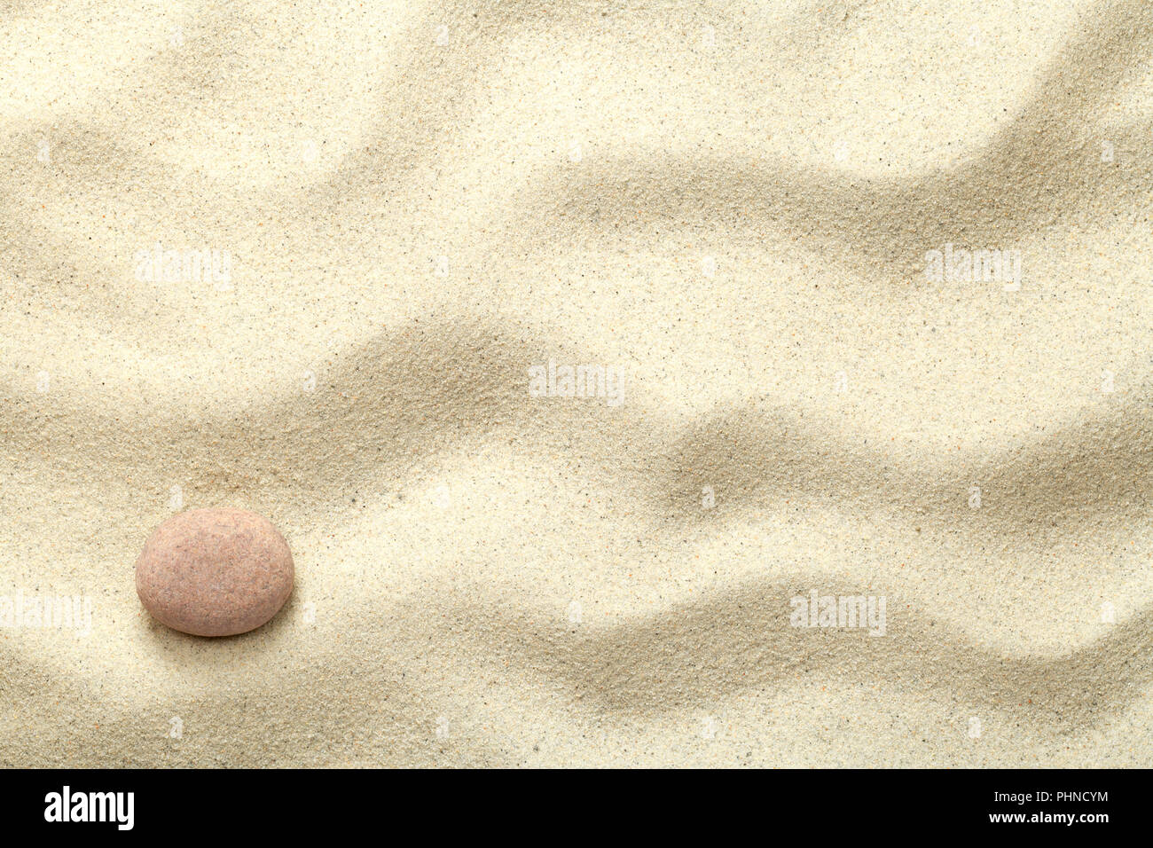 Sand Background with Stone Stock Photo - Alamy