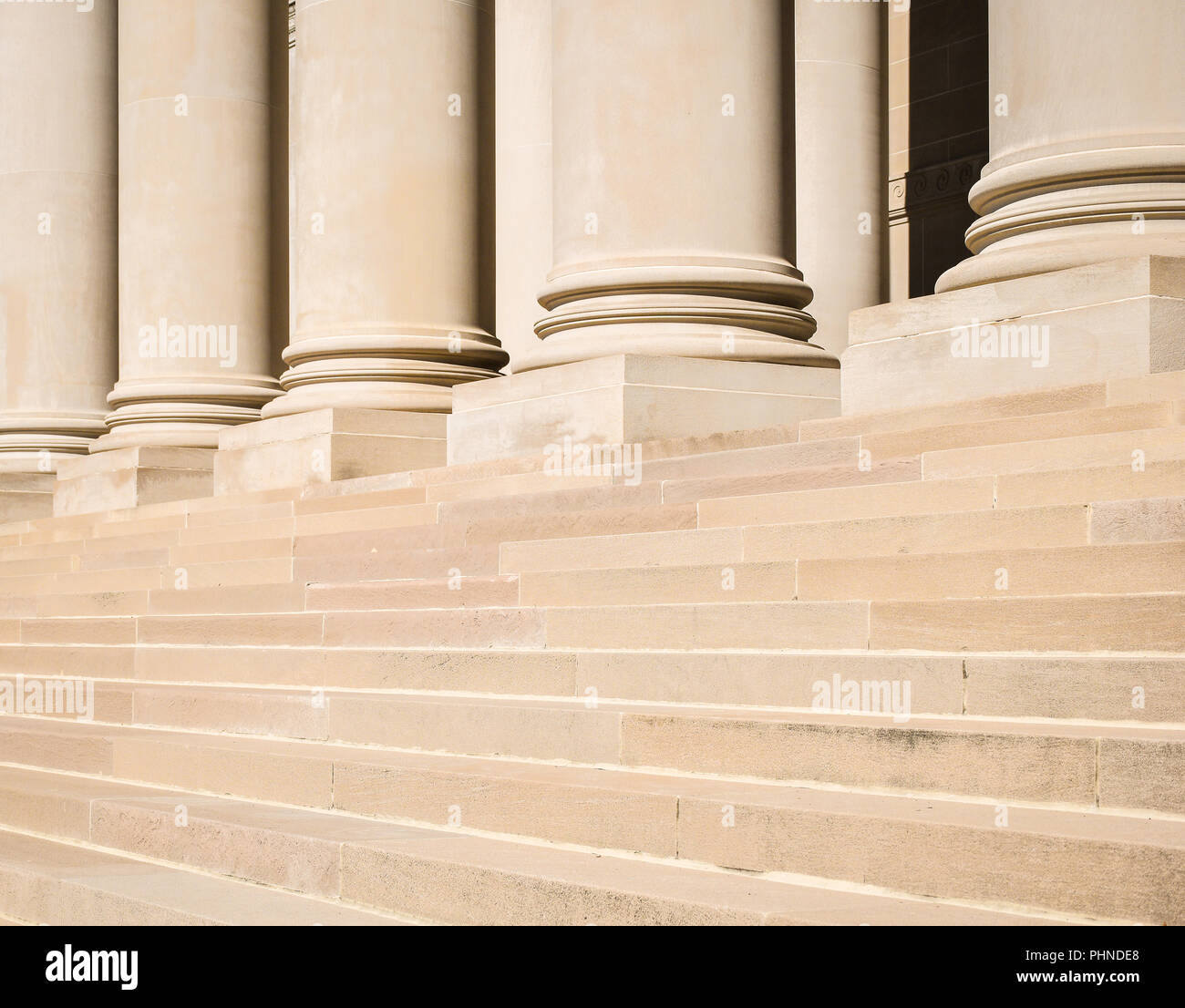 Architectural detail of columns and marble steps outside a government ...