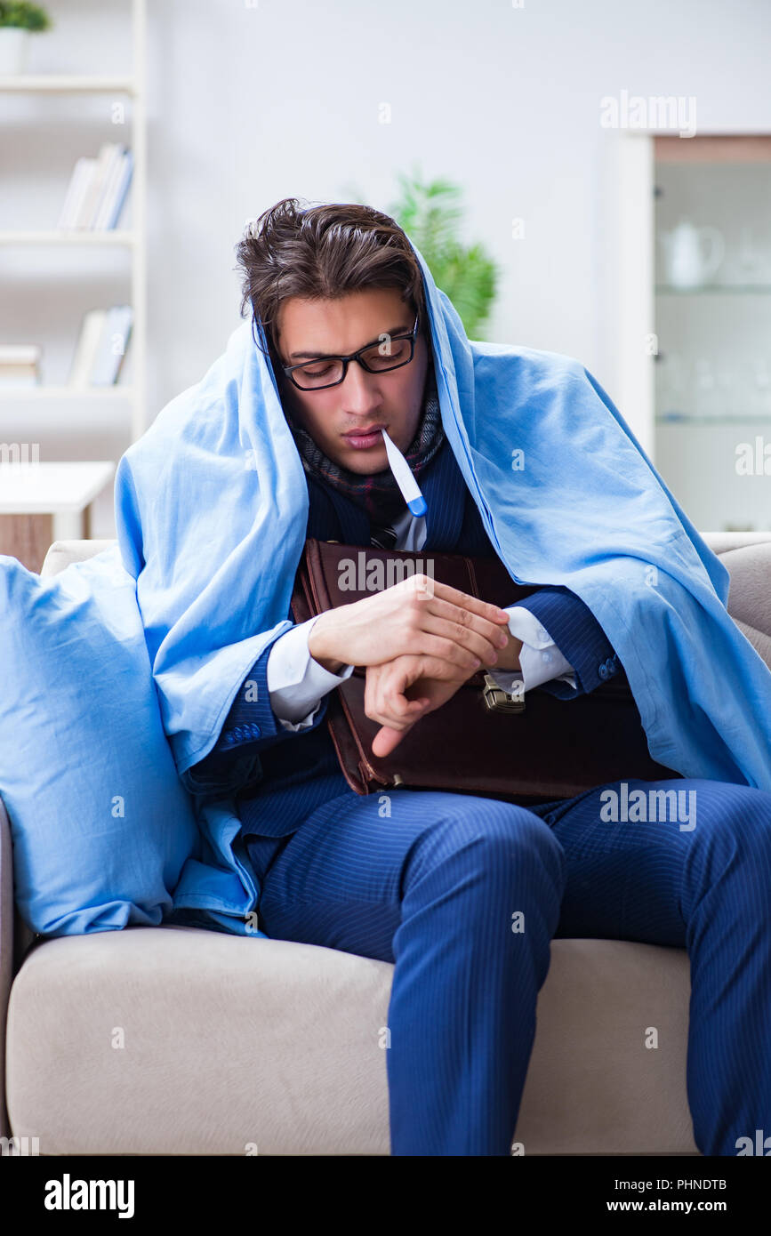 Sick employee staying at home suffering from flue Stock Photo - Alamy