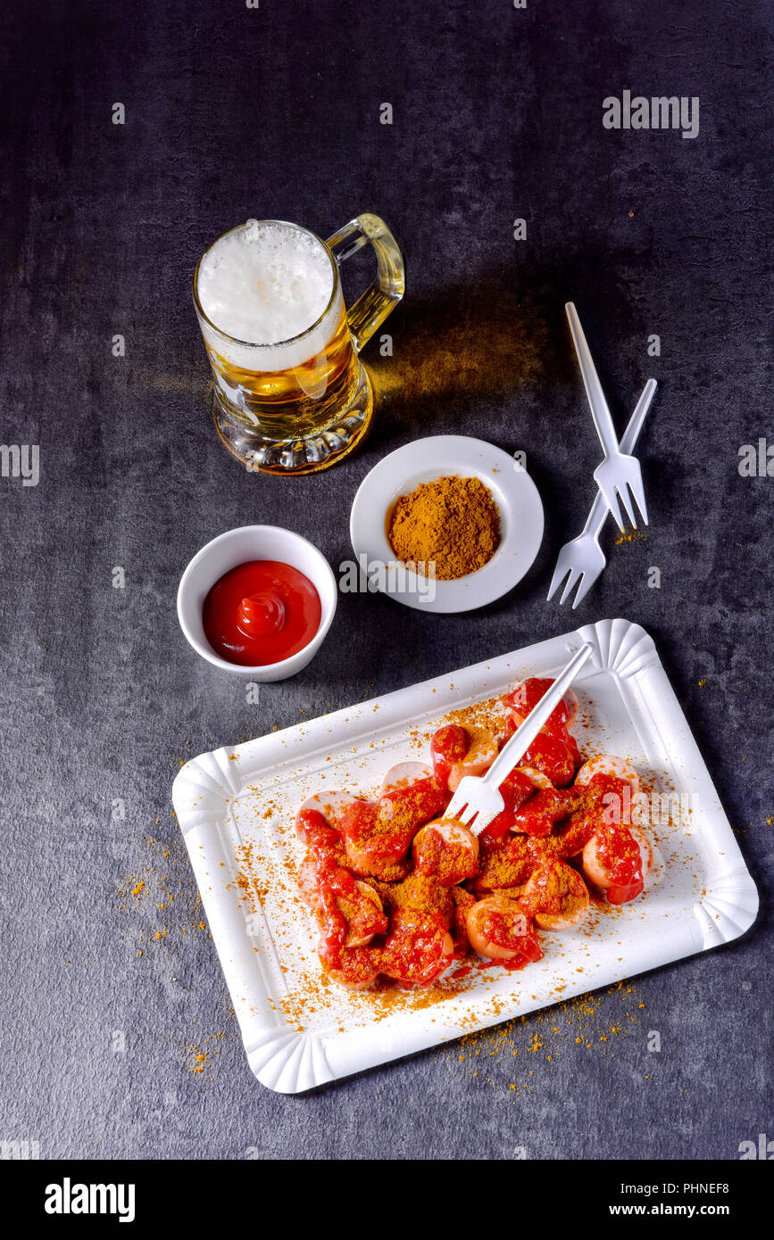 Curry bockwurst with beer Stock Photo - Alamy
