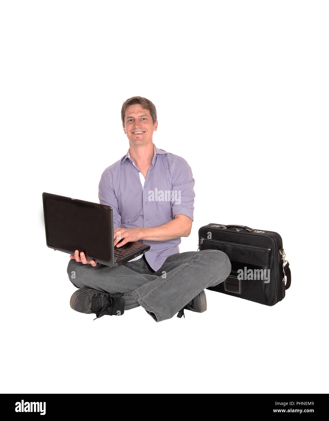 Smiling man laptop using Cut Out Stock Images & Pictures - Alamy