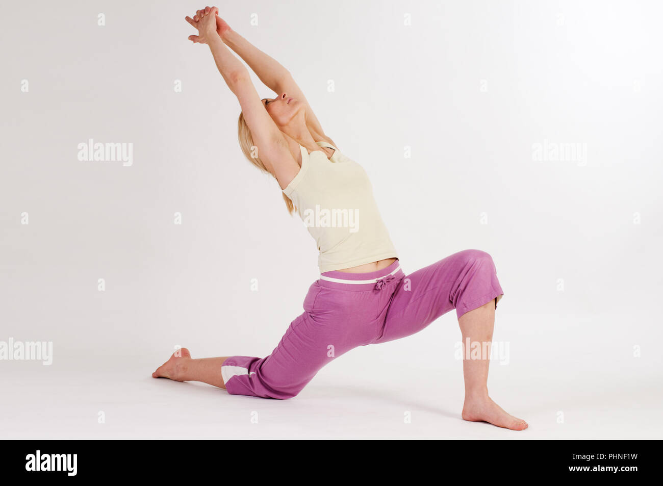 Half moon posture hi-res stock photography and images - Alamy