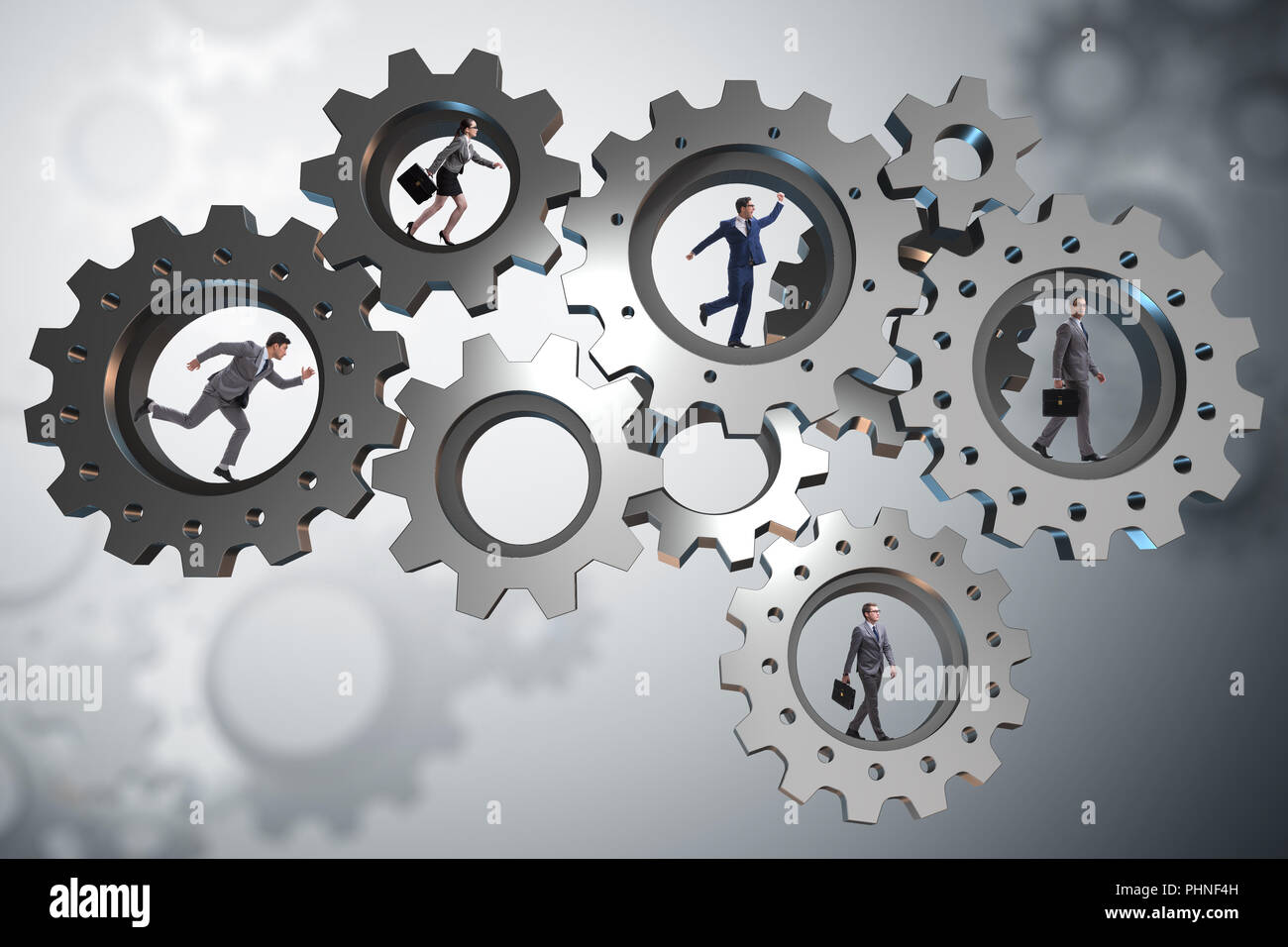 Teamwork concept with cogwheels and business people Stock Photo - Alamy