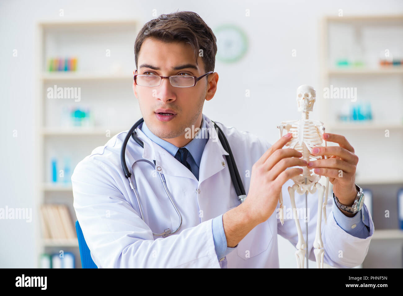 Doctor explaining bones anatomical hi-res stock photography and images ...