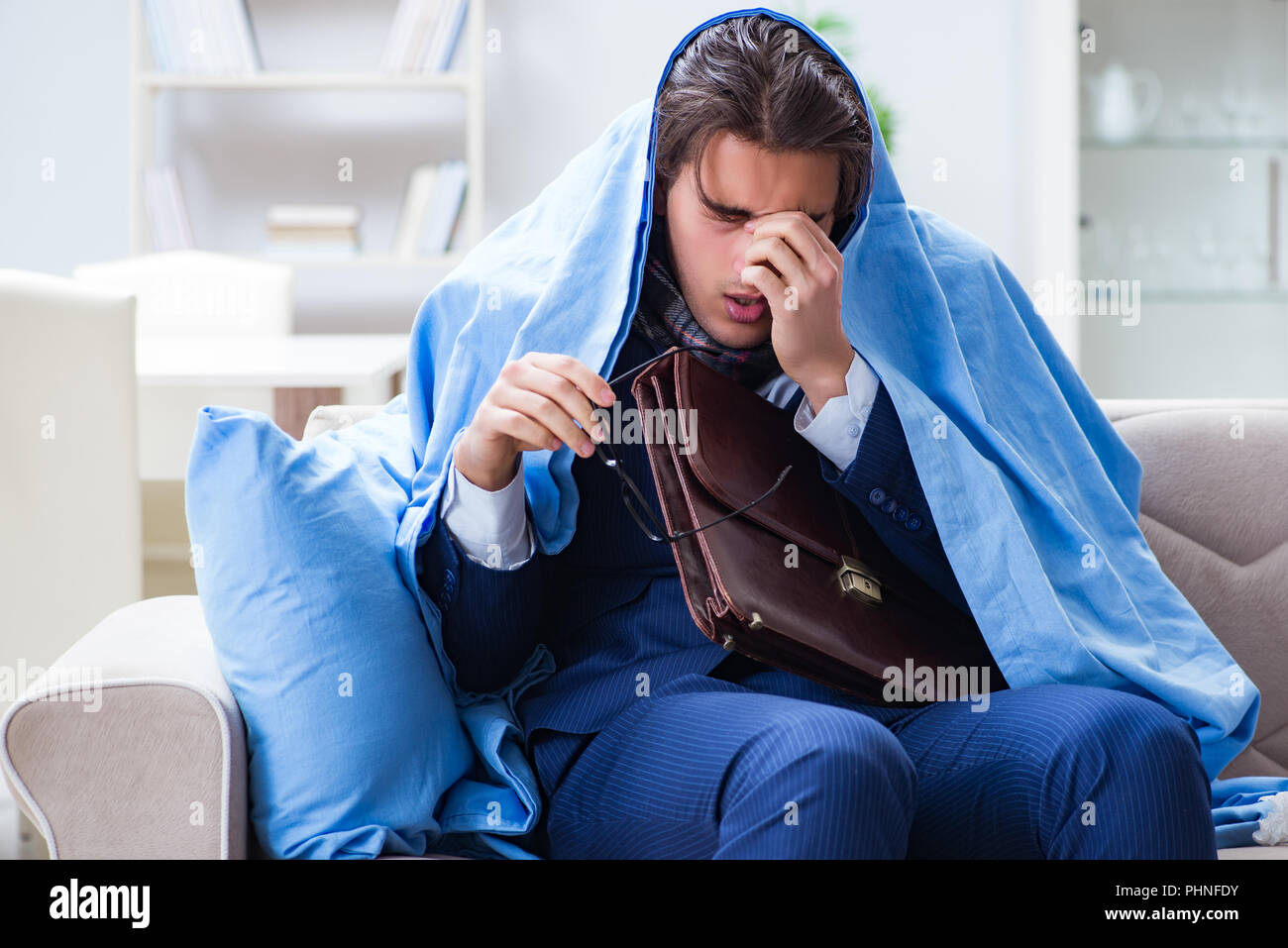 Sick employee staying at home suffering from flue Stock Photo - Alamy