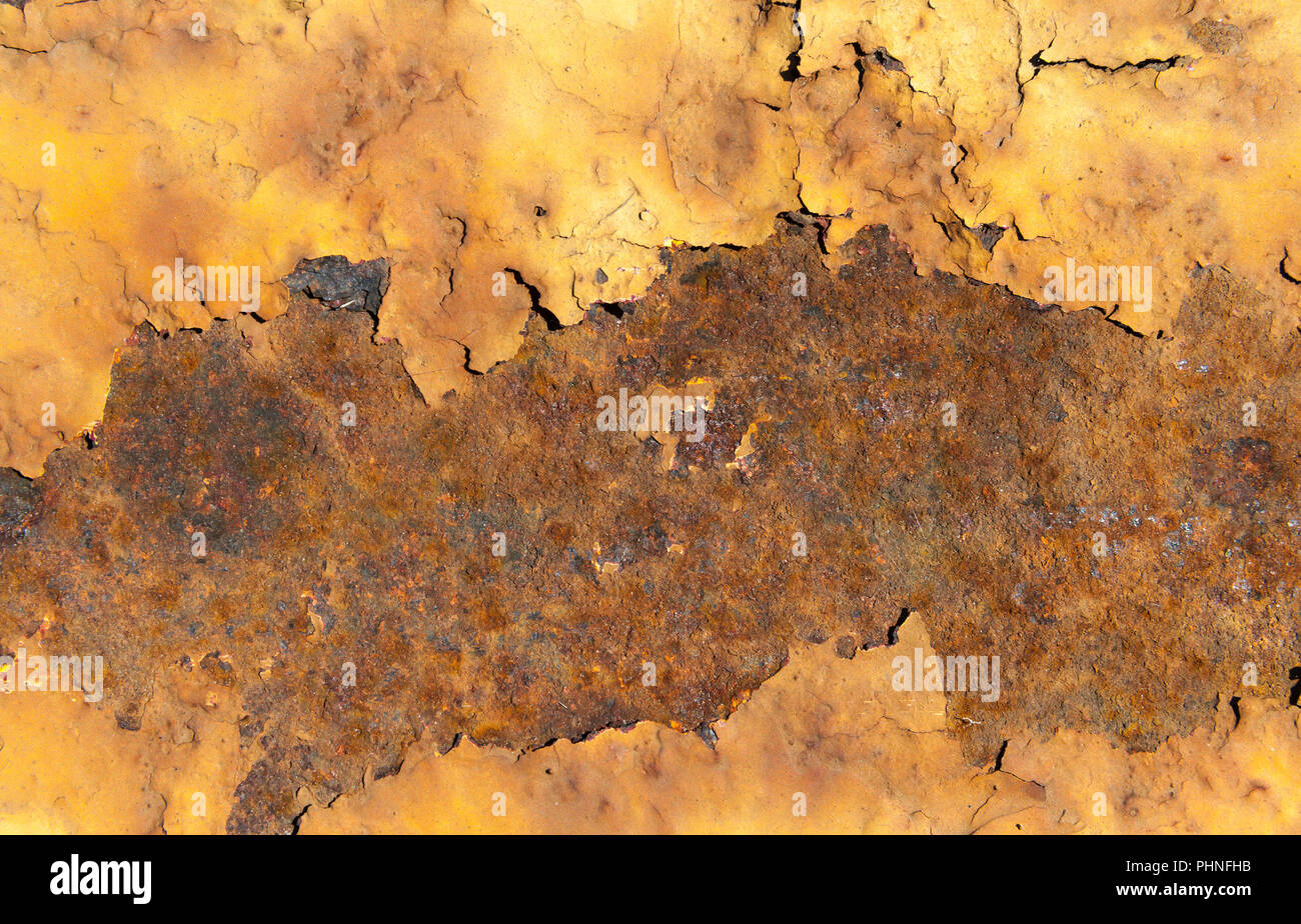 old rusty metal on which corrosion was formed, closeup of part of the ...