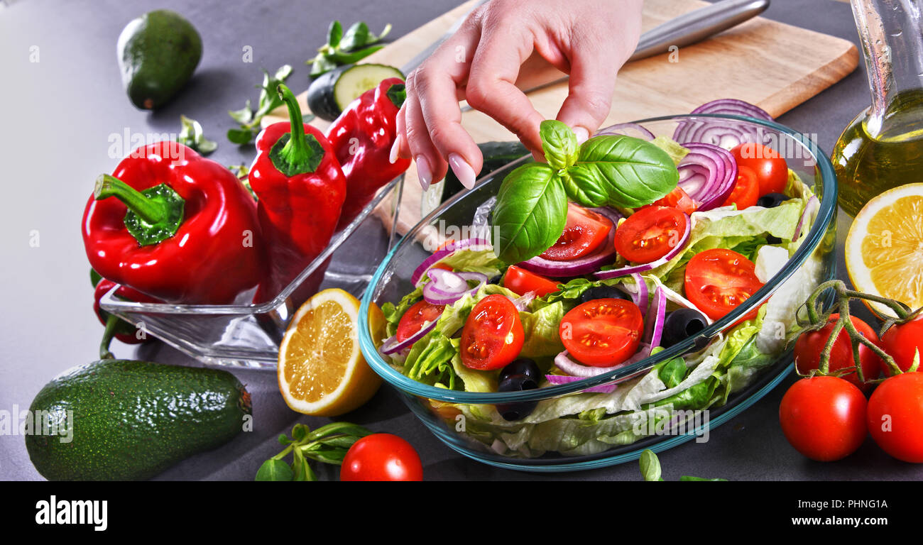 Preparation of a vegetable salad from fresh organic ingredients Stock ...