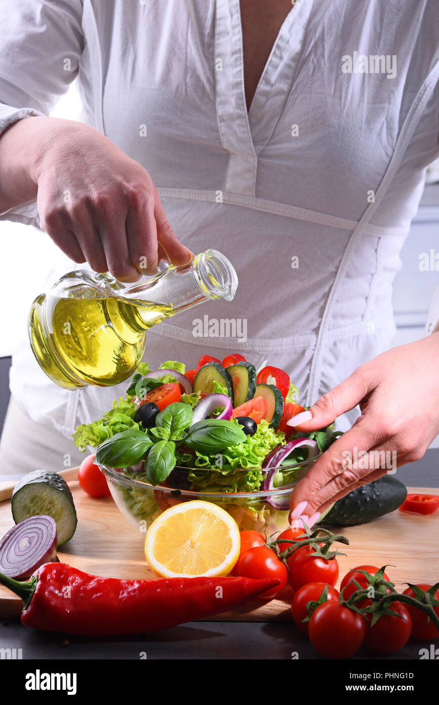Preparation of a vegetable salad from fresh organic ingredients Stock ...