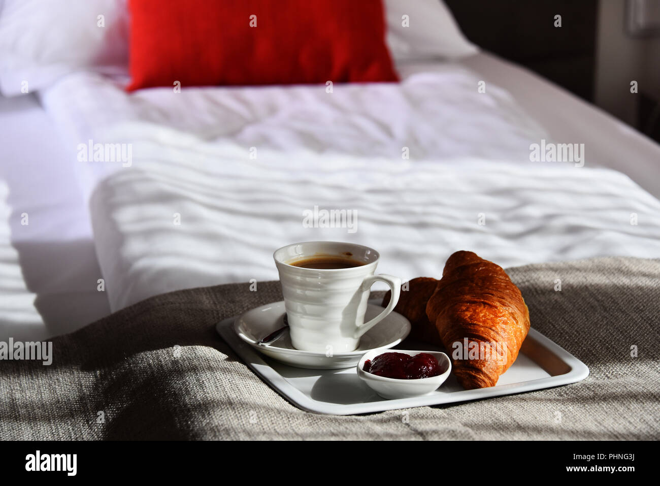 Breakfast in bed in hotel room Stock Photo - Alamy