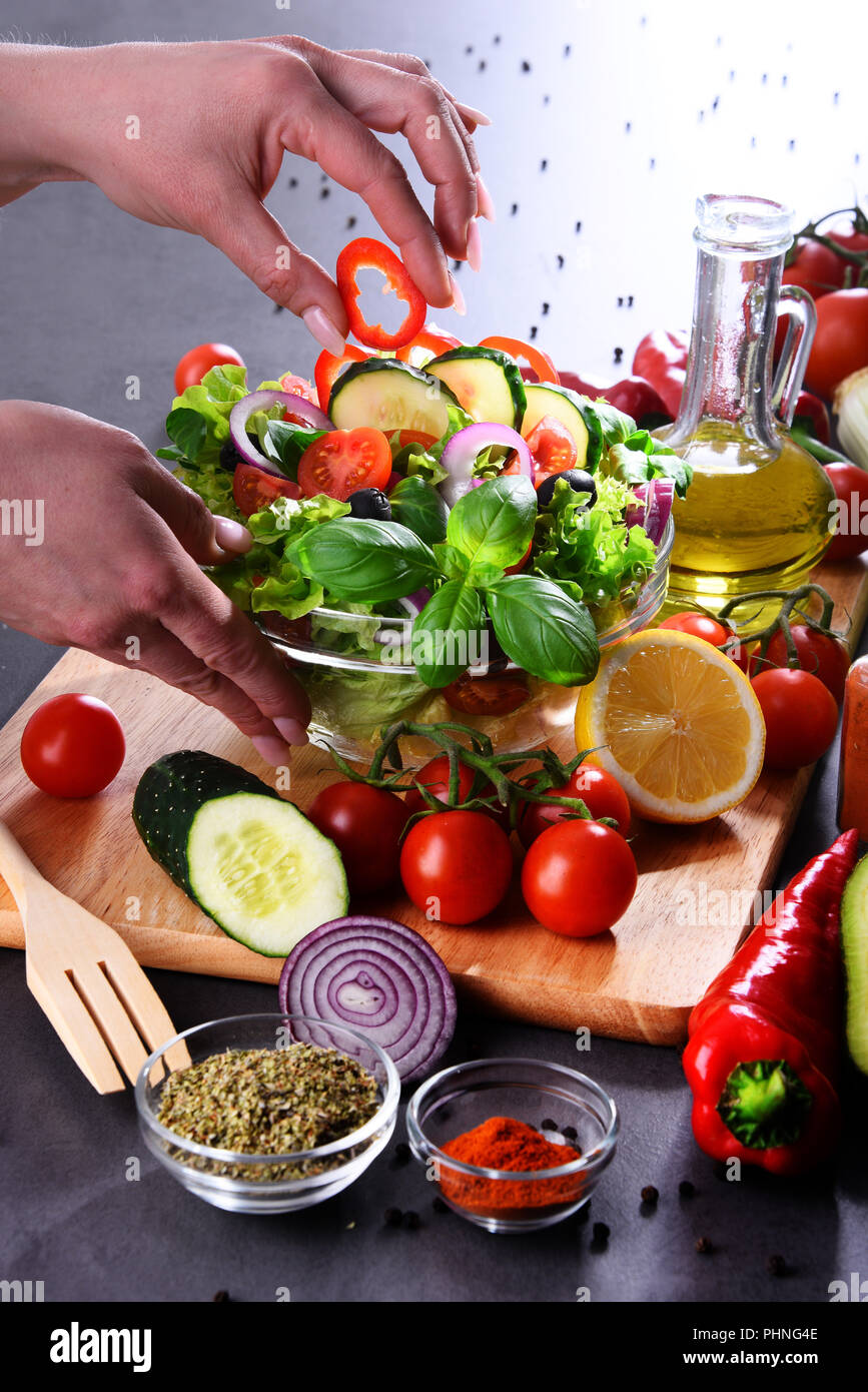 Preparation of a vegetable salad from fresh organic ingredients Stock ...