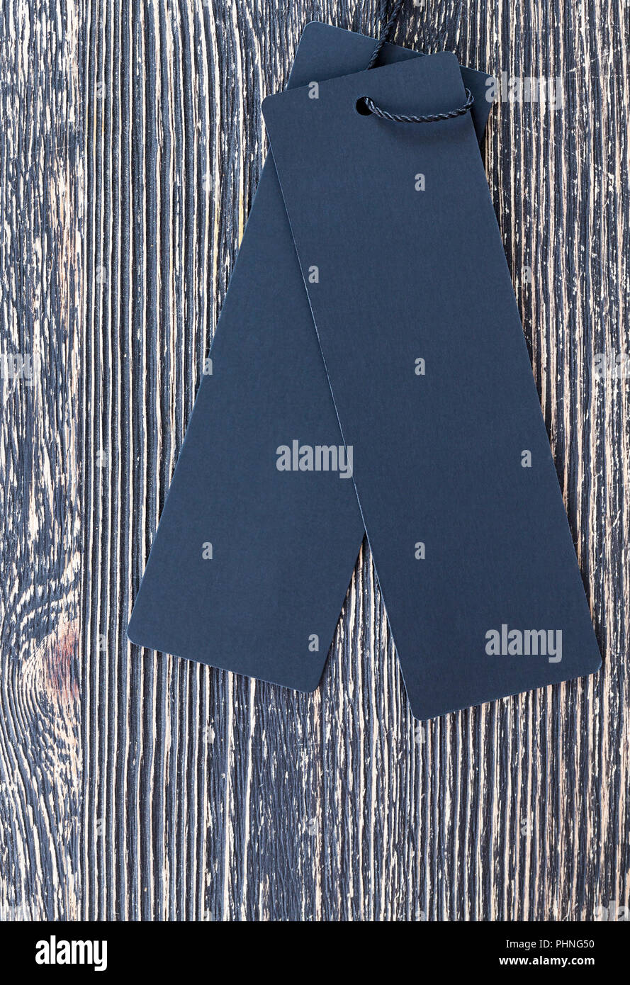 connected by two black paper labels for writing prices, discounts and ...